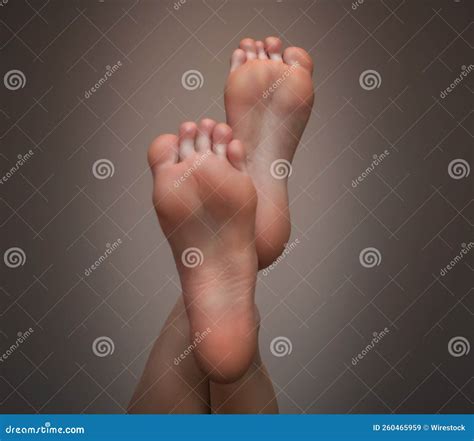 Close Up Shot Of Female Feet Isolated On A Beige Background Stock Image Image Of Close Foot
