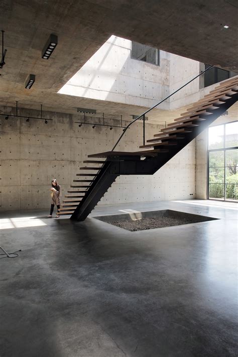 Concrete Art Gallery And Studio In Bangkok Features Four Storey Atrium