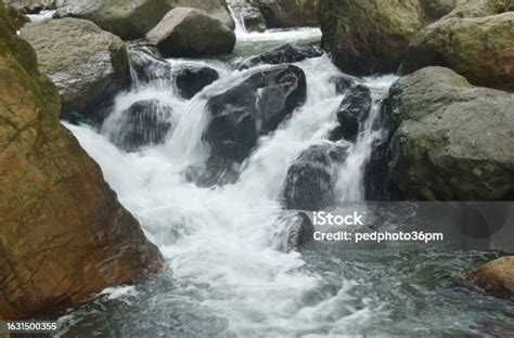Water Falling On River Pass Rock And Stone At Kho Chong Lom Waterfall