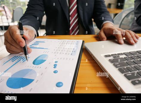 Hands Of Business People Analyzing Chart Finance Managers Task Stock