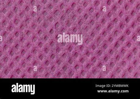 Surface Texture Background Of The Purple Non Woven Fabric Is Rough And