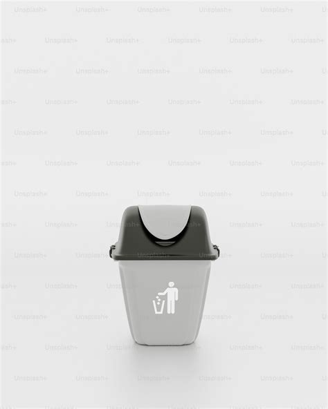 검은 뚜껑이 달린 흰색 쓰레기통 사진 Unsplash의 배경 화면 이미지