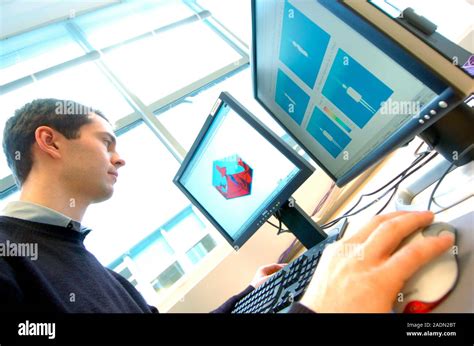 MODEL RELEASED Computer Modelling Man Using A Computer To Model Three Dimensional Graphics