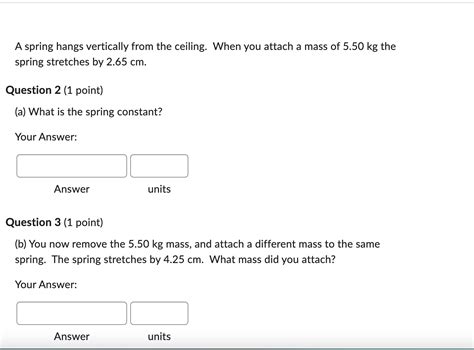 solved a spring hangs vertically from the ceiling when you