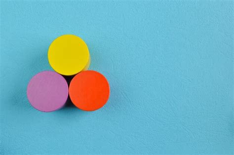 Premium Photo Colorful Wooden Cube Blocks Isolated On A Blue Background