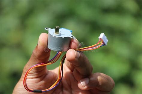 Stepper Motor That Runs On A Dc Power On Nature Background Held In The