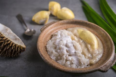 Premium Photo Sweet Sticky Rice With Durian And Coconut Milk Sauce