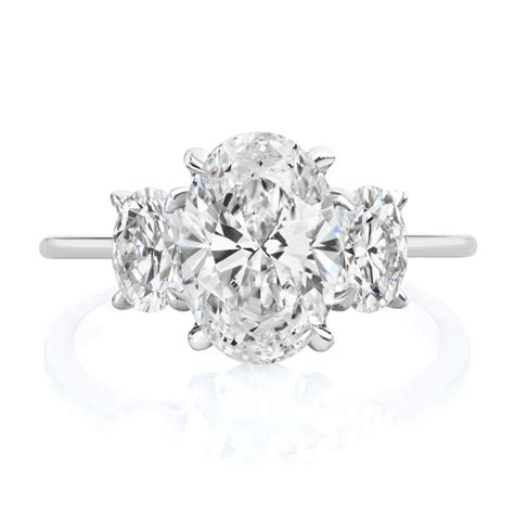 Oval Diamond Engagement Ring With Oval Side Stones