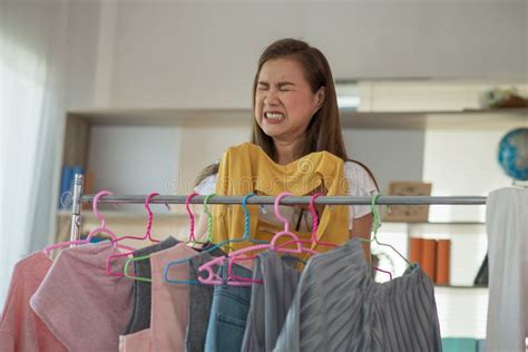 Housewife Asian Woman Is Smelly Stinky Musty From Clothes Stock Image