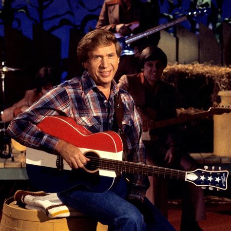 Download American Country Legend Buck Owens In His Prime Wallpaper