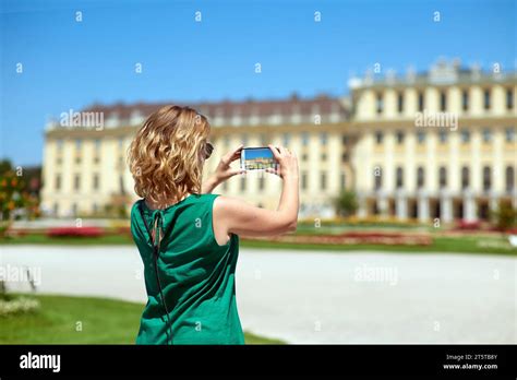 Blonde Tourist Girl Takes Pictures Of Wien Schönbrunn Palace On Her