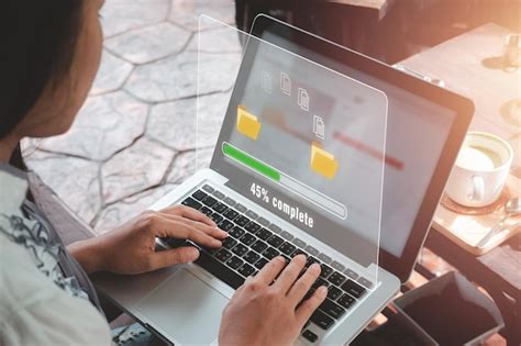 Premium Photo Transfer Files Data System Relocation Concept Person Hand Using Laptop Computer