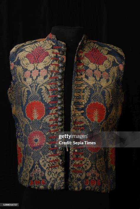 Woolen Combizole With Woven Flower Pattern And Moldings Vest News Photo Getty Images