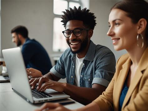 A Man And A Woman Are Sitting At A Laptop Computer Smiling And Smiling Premium Ai Generated Image