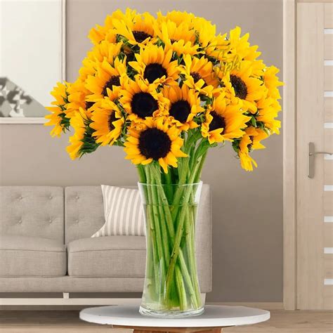 Sunflowers In Glass Vase