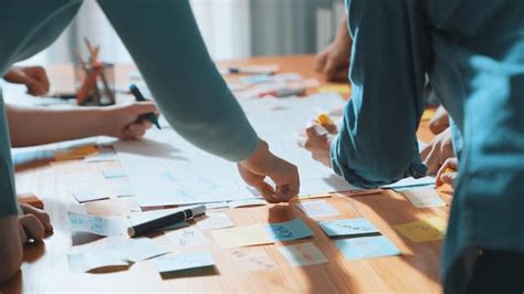 Premium Photo Close Up Of Smart Developer Team Using Mind Map To