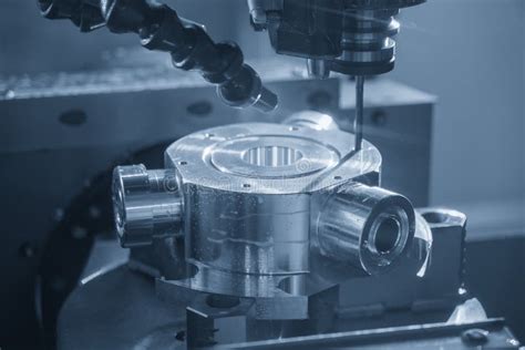 The 5 Axis CNC Milling Machine Hole Cutting On The Metal Part Stock Image Image Of Process