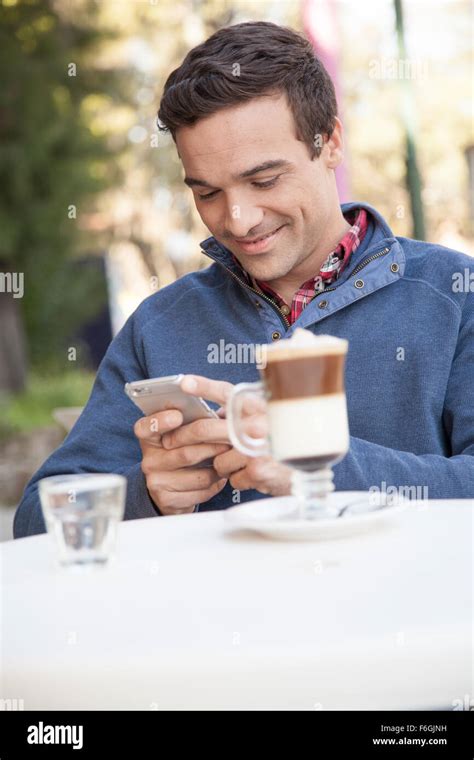 Man Sending A Message Stock Photo Alamy