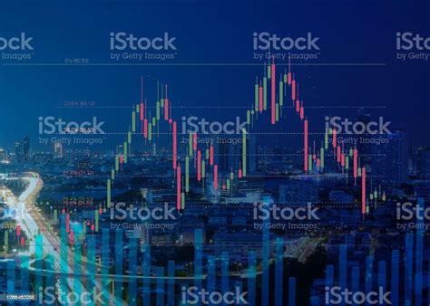 Stock Graph Chart With Fibonacci Indicator And Cityscape Night View On