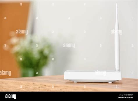 Modern Wi Fi Router On Table In Room Stock Photo Alamy