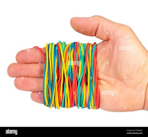 A Hand Grasps A Collection Of Vibrant Elastic Bands In Different Colors