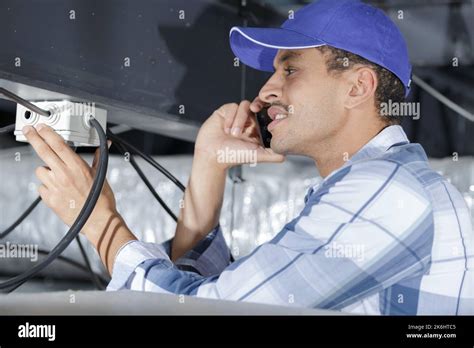 Installing Optic Hi Res Stock Photography And Images Alamy