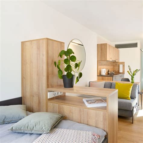 Smart Furniture Creates Storage Space In Micro Flat By Naimi Architecture