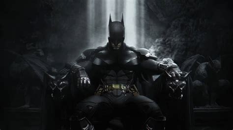 Download Oled 4k Batman Sitting On Chair Wallpaper