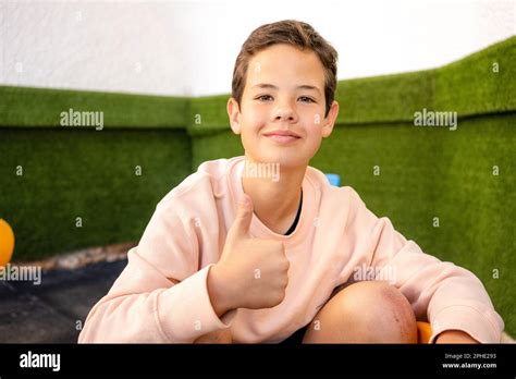 Portrait Of Attractive Happy Smiling 11 Years Old Boy Outdoor Over