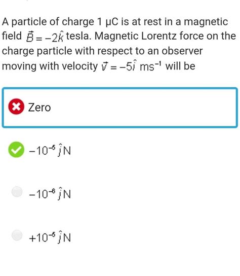 Answered A Particle Of Charge 1 C Is At Rest In A Magnetic Field 2