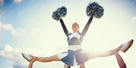 Premium Photo Cheerleader Woman Sky And Sports Performance With Smile