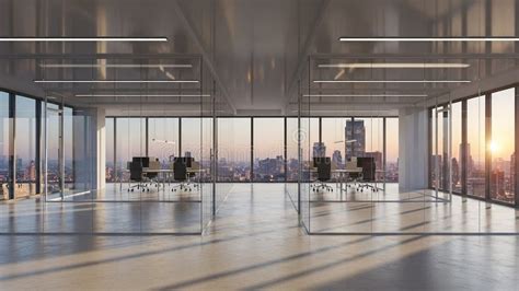 Modern Glass Walled Office Interior With City Skyline View At Sunset