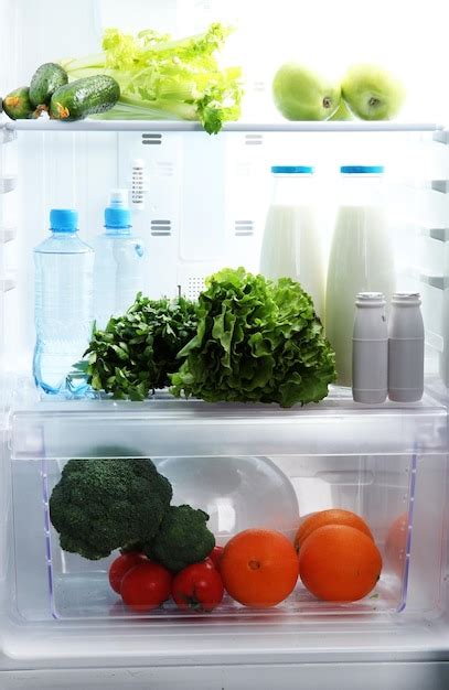 Premium Photo Open Refrigerator With Vegetarian Food