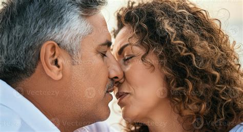 Intimate Moment Between Mature Caucasian Couple Embracing Love And