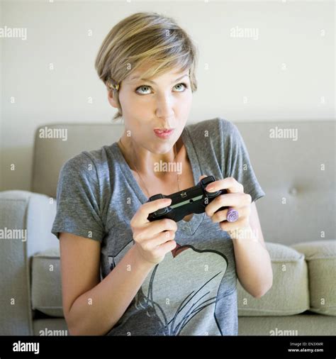 Woman Holding A Video Game Controller Stock Photo Alamy