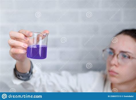 The Girl Examines The Chemical Preparation In The Flask Laboratory Research Stock Image Image