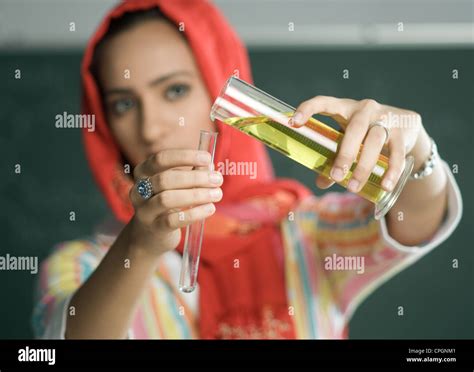 Teacher Holding Measuring Tubes Close Up Stock Photo Alamy