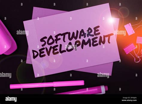 Hand Writing Sign Software Development Word Written On Software Is Created Using A Specific