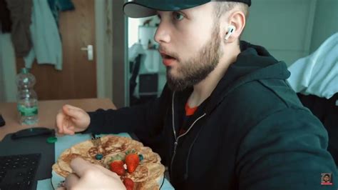 Guy Wearing Cap Burps