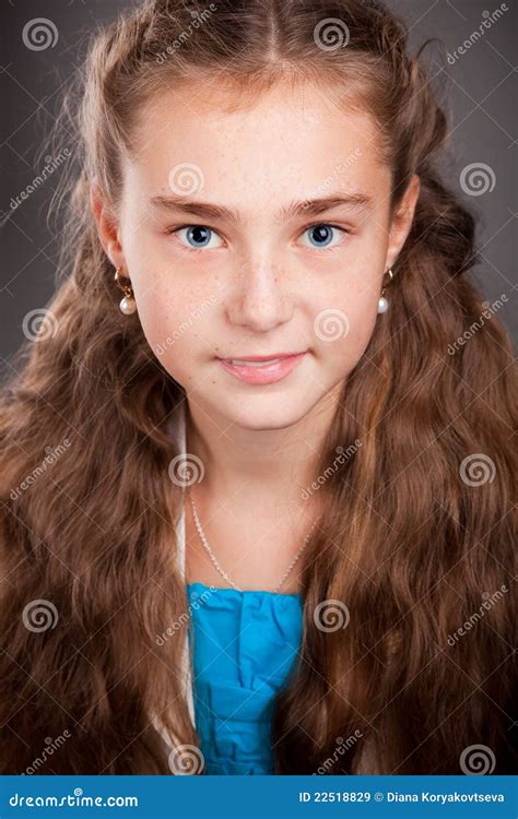 Portrait Of A Young Girl With Brown Curly Hair Stock Image Image Of
