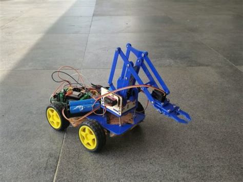 Esp32 Based Robotic Arm Car Controlled With Ps3 Bluetooth