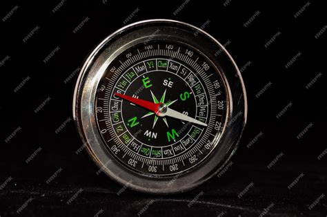 Premium Photo Vintage Classic Compass On A Black Background