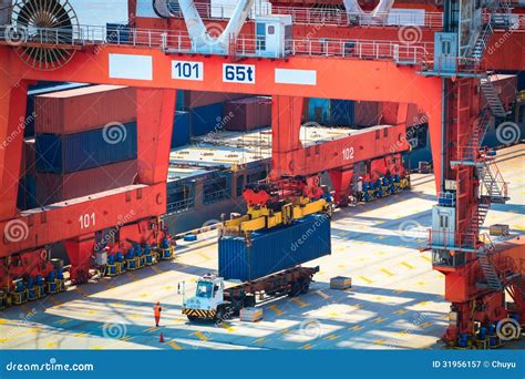 Container Operation In Port With Cranes And Gantry Loading Discharging Containers Royalty Free