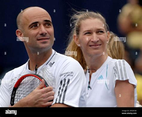 Tennis Greats Andre Agassi Left And His Wife Steffi Graf Take Part In