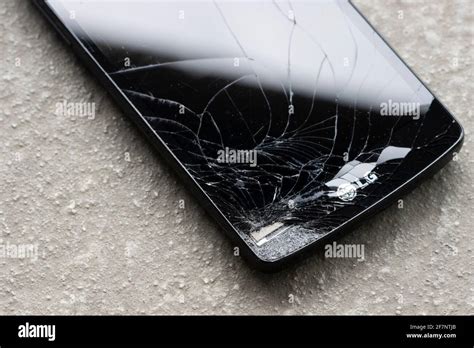 The Lg Logo Is Seen On A Cracked Smartphone On April Lg Electronics Has Confirmed Its