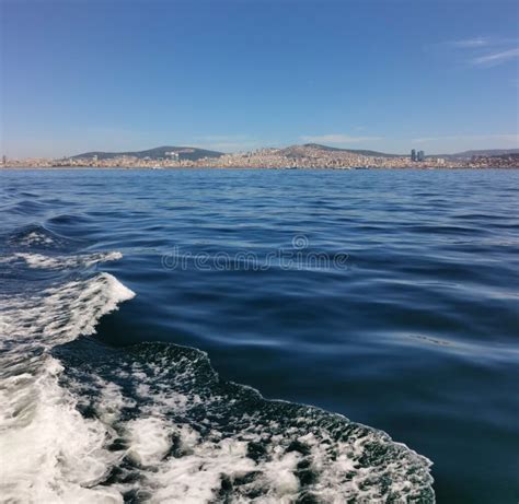 The Glassy Texture Of The Sea Surface Disturbed And Foamed By The Passing Boat Stock Image