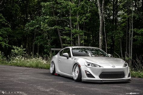 Silver Car White Wheels