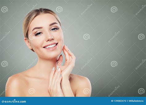 Beautiful Woman Smiling And Touching Her Hand Her Face Cute Girl With Clear Skin Stock Image