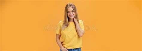 Portrait Of Shy And Timid Feminine Girl With Tan And Straight Fait Hair