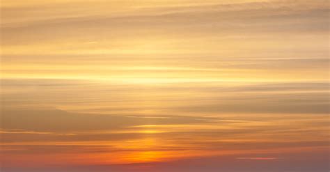 Yellow And Orange Dramatic Sunset Sky Premium Photo